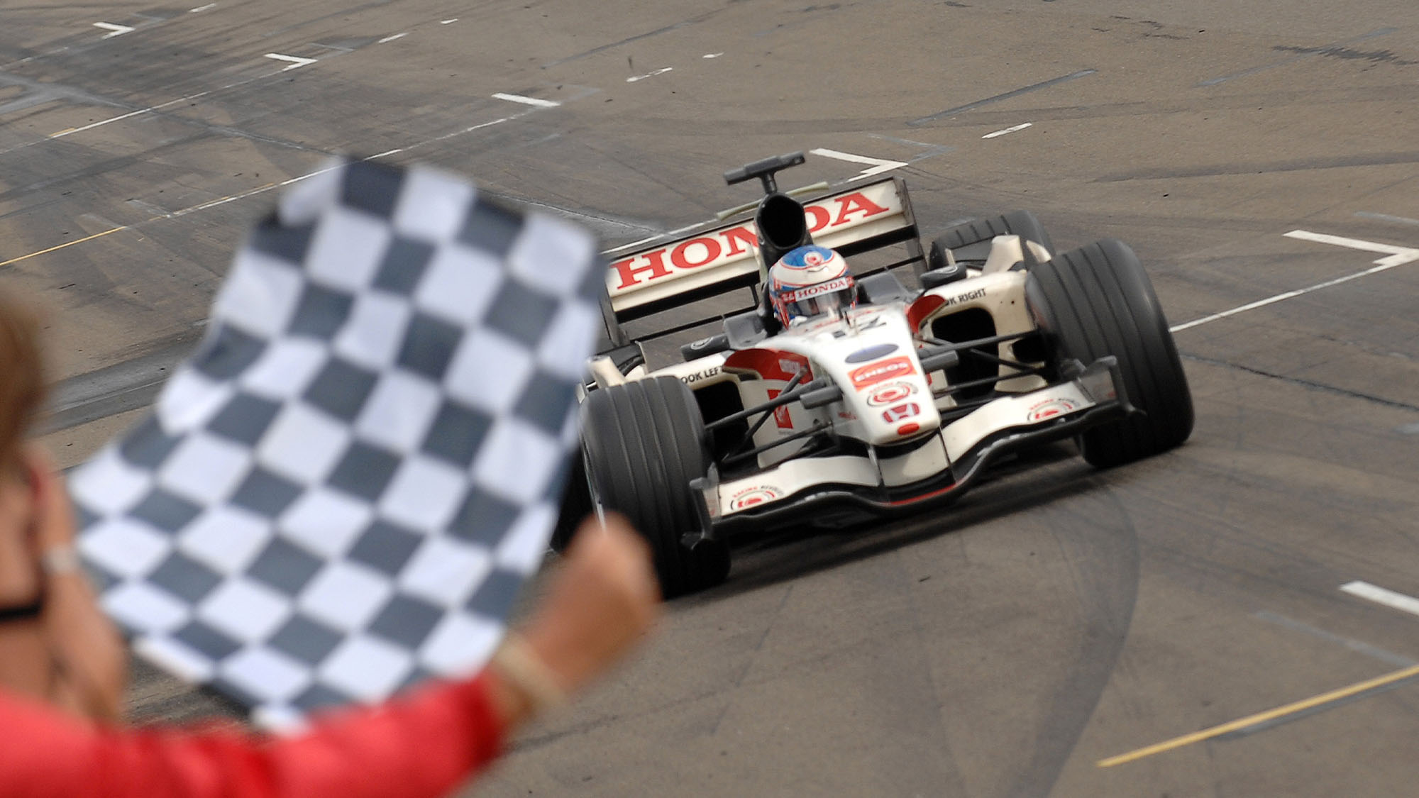 Jenson Button remembers his first F1 win: ‘I never wanted those laps to ...